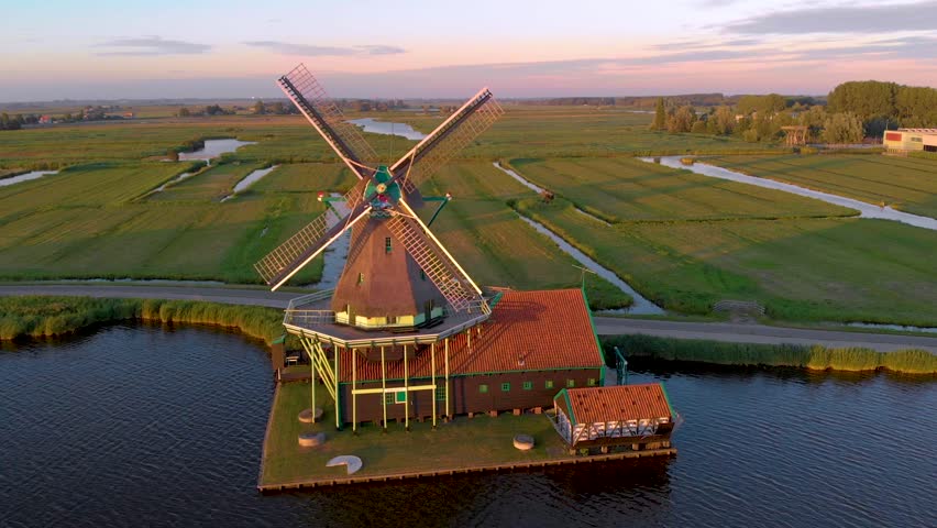 flying around old windmill during sunset Stock Footage Video (100% ...