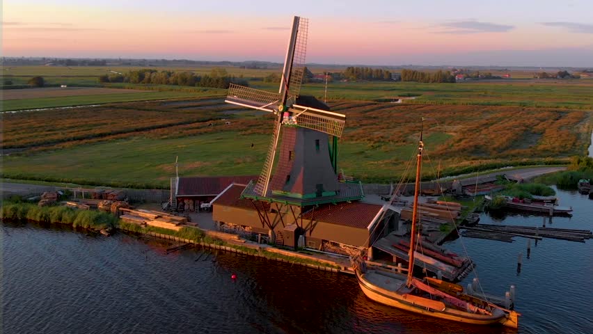 Windmill by the shoreline in the Netherlands image - Free stock photo ...