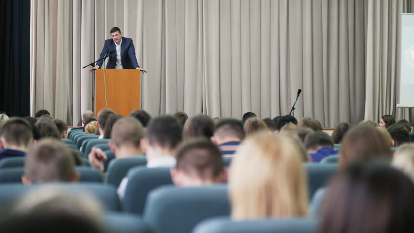 young politician stands on stage front Stock Footage Video (100% ...
