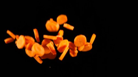 Falling Cutted Carrot Slices Isolated On Stock Footage Video (100% ...