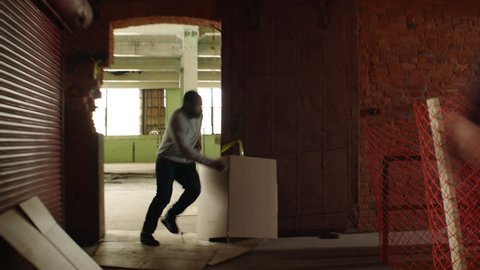 Camera Chases Two Men Fighting Industrial Stock Footage Video (100% ...