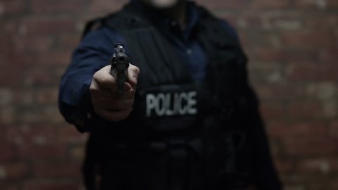 Police Officer Demonstrates Use His Weapon Stock Footage Video (100% ...