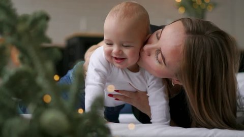 Mother Giving Peck Her Sleeping Newborn Stock Footage Video (100% ...