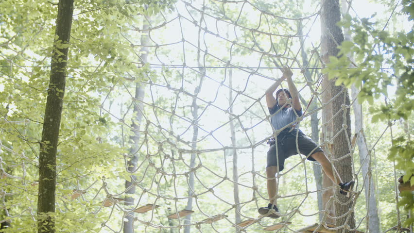 Person Climbing Over the Net Stock Footage Video (100% Royalty-free ...