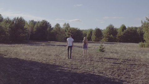 Aerial Shooting Guy Chasing Girl Through Stock Footage Video (100% ...