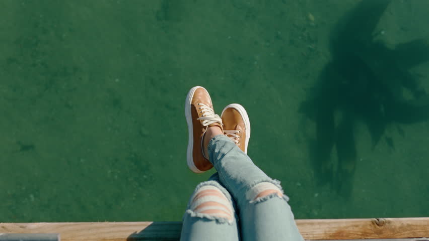 top view woman legs dangling over Stock Footage Video (100% Royalty ...
