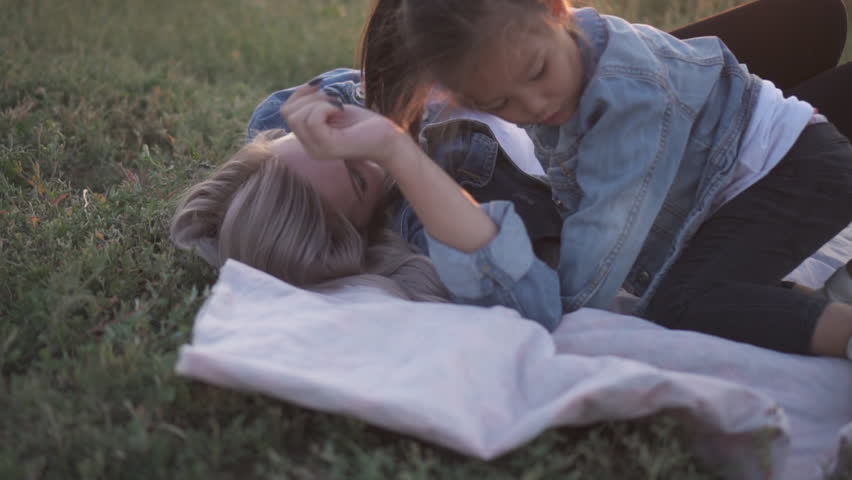smiling couple reading books while lying Stock Footage Video (100% ...