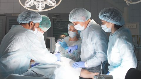 Team Professional Multirace Doctors Operating Surgery Stock Footage ...