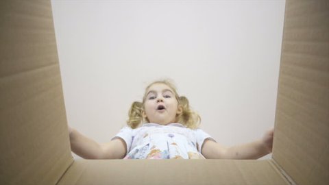 Little Girl Looks Box Surprised Happy Stock Footage Video (100% Royalty ...