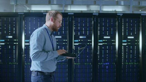 Modern Data Center Engineer Standing Beside Stock Footage Video (100% ...