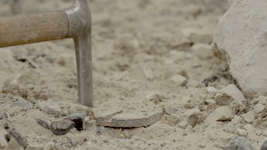 miner breaking rock by pick axe Stock Footage Video (100% Royalty-free ...