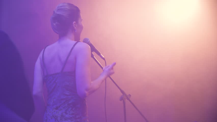 stedicam fly around girl singer performing Stock Footage Video (100% ...