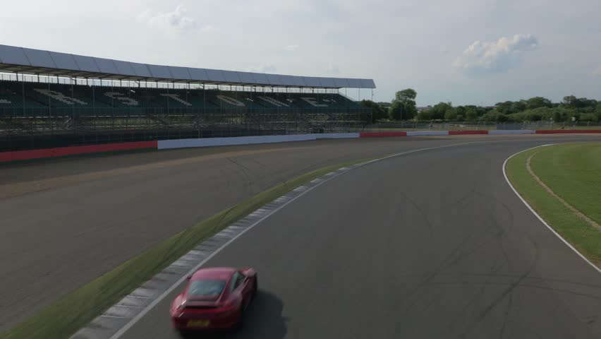 Two cars racing around the track image - Free stock photo - Public ...