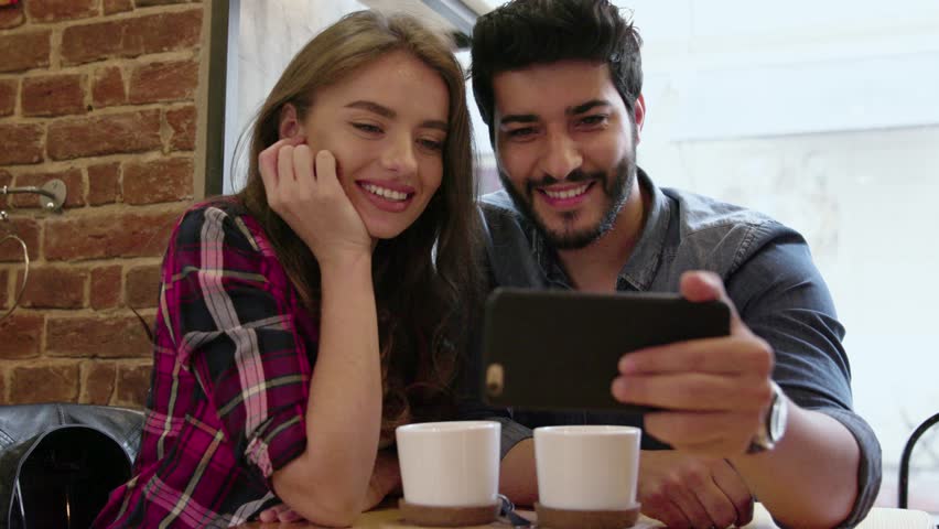 video calling happy couple using phone Stock Footage Video (100% ...