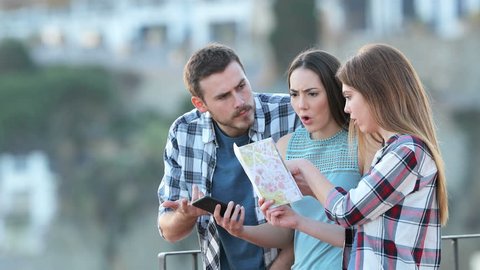 Three Angry Lost Tourists Arguing Checking Stock Footage Video (100% ...