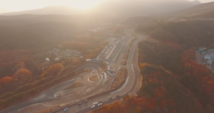 Two cars racing around the track image - Free stock photo - Public ...
