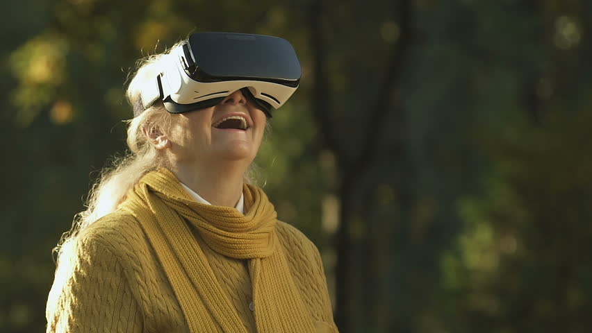 old woman using vr headset exploring Stock Footage Video (100% Royalty ...