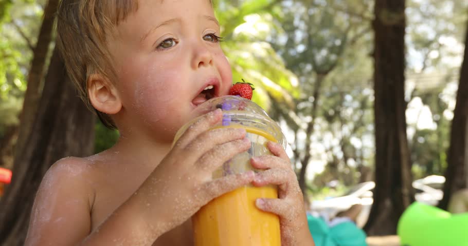 Adorable Little Kid Drinking Cold Stock Footage Video (100% Royalty ...
