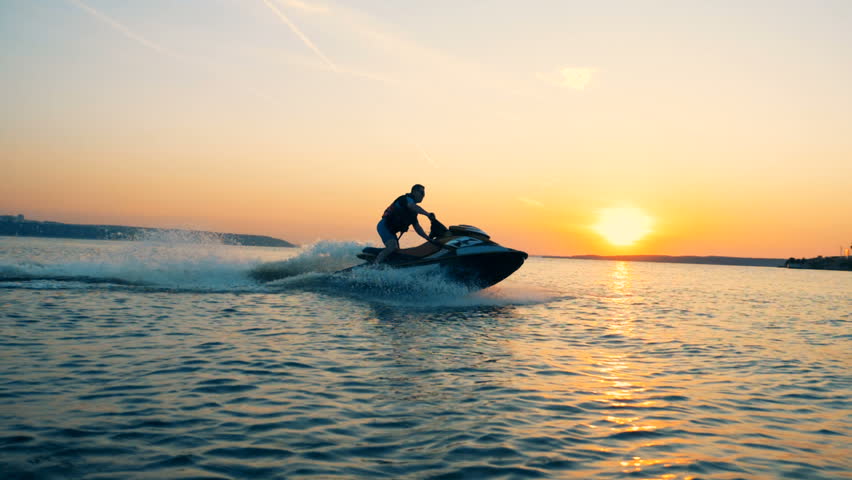 Water Scooters Rider is Turning Stock Footage Video (100% Royalty-free ...