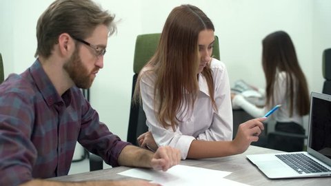 Young Woman Man Discuss Project On Stock Footage Video (100% Royalty ...