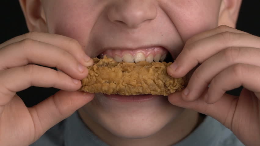 Footage Portrait Boy Eats Chicken Stock Footage Video (100% Royalty ...