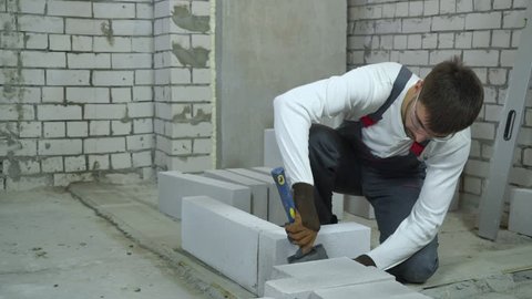Construction Worker Beating Aerated Concrete Block Stock Footage Video ...