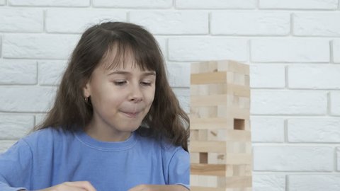 Child Collapses Tower Wooden Blocks Little Stock Footage Video (100% ...