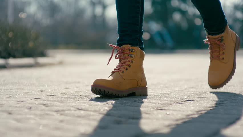 close-up low-angle tracking shot unrecognizable woman Stock Footage ...