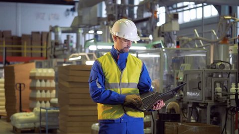 Dedicated Smiling Factory Worker Standing Next Stock Photo (Edit Now ...