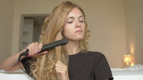 Young Woman Styling Her Hair Stock Footage Video (100% Royalty-free ...