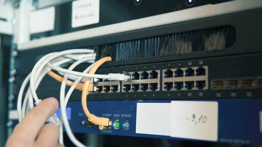engineer patching network equipment server room Stock Footage Video ...
