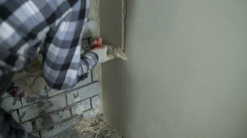 Builder Filling Gaps Wall Plaster Free Stock Footage Video (100% ...
