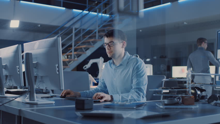 Two Electronics Development Engineers Working On Stock Footage Video ...