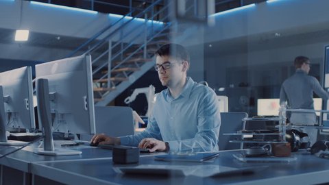 Two Electronics Development Engineers Working On Stock Footage Video ...