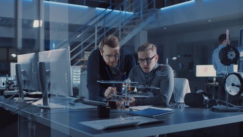 Two Electronics Development Engineers Working On Stock Footage Video ...