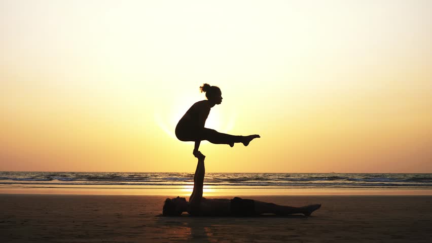 somersault-pose-of-young-women-on-beach image - Free stock photo ...