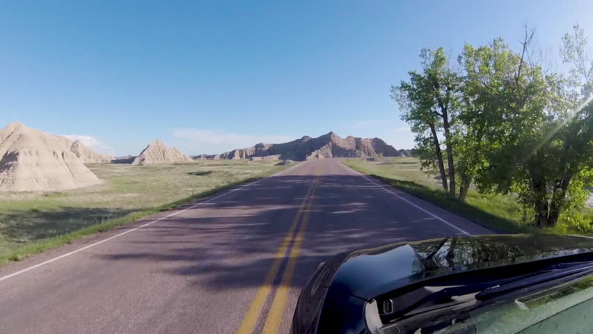 Road through the badlands at Badlands National Park, South Dakota image ...