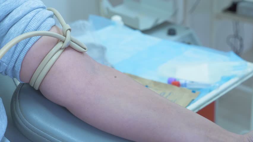 doctor puts needle patient's arm take Stock Footage Video (100% Royalty ...