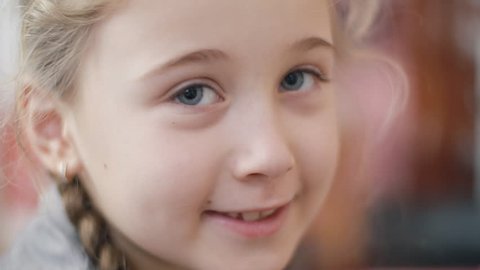 little girl staring camera smiling Stock Footage Video (100% Royalty ...