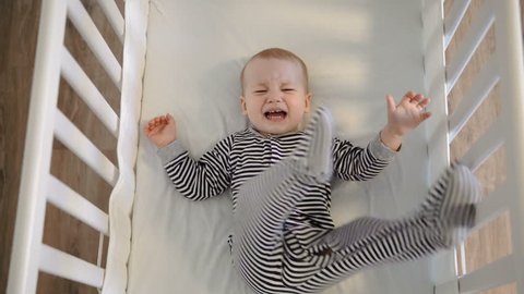 Little Boy Crying Crib Child Teething Stock Footage Video (100% Royalty ...