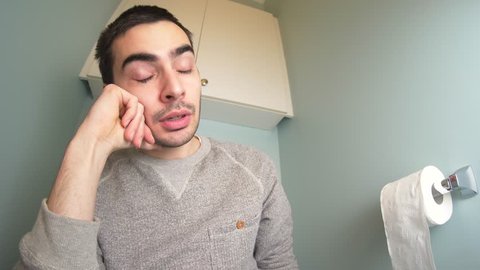 Straining Man On Toilet Seat Being Stock Footage Video (100% Royalty ...