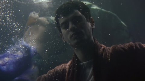 Portrait Mans Unconscious Body Floating Underwater Stock Footage Video ...