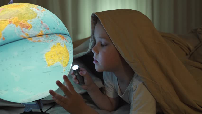 child boy looking flashlight globe children's Stock Footage Video (100% ...