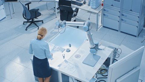 Stylish Female Industrial Robotics Engineer Looks Stock Footage Video ...