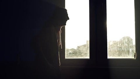 Silhouette Man Wants Jump Through Window Stock Footage Video (100% ...