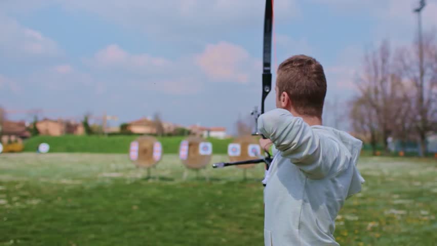 archer throws arrow into shooting range Stock Footage Video (100% ...