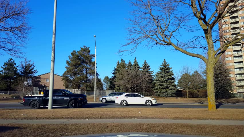 side view city traffic driving by Stock Footage Video (100% Royalty ...