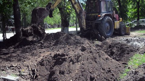 Tractor Pits Ground Backhoe Piles Ground Stock Footage Video (100% ...