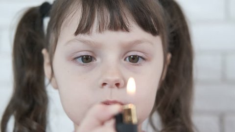 Child Plays Fire Lighter Stock Footage Video (100% Royalty-free ...