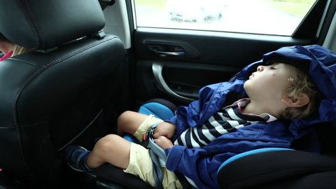 Child Backseat Car On Road Parents Stock Footage Video (100% Royalty ...